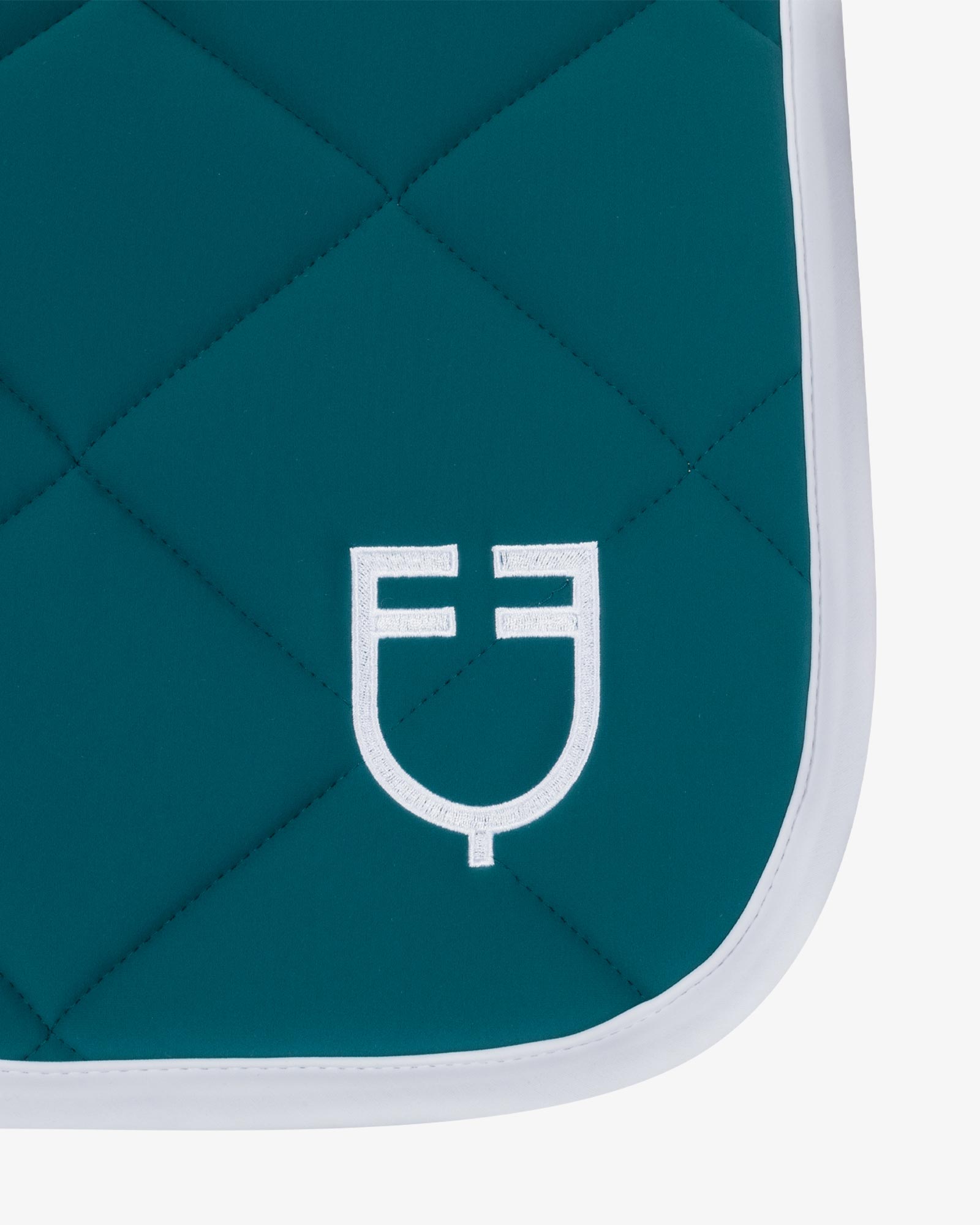 Quilted dressage saddle pad with embroidered logo | Shop | Equestro